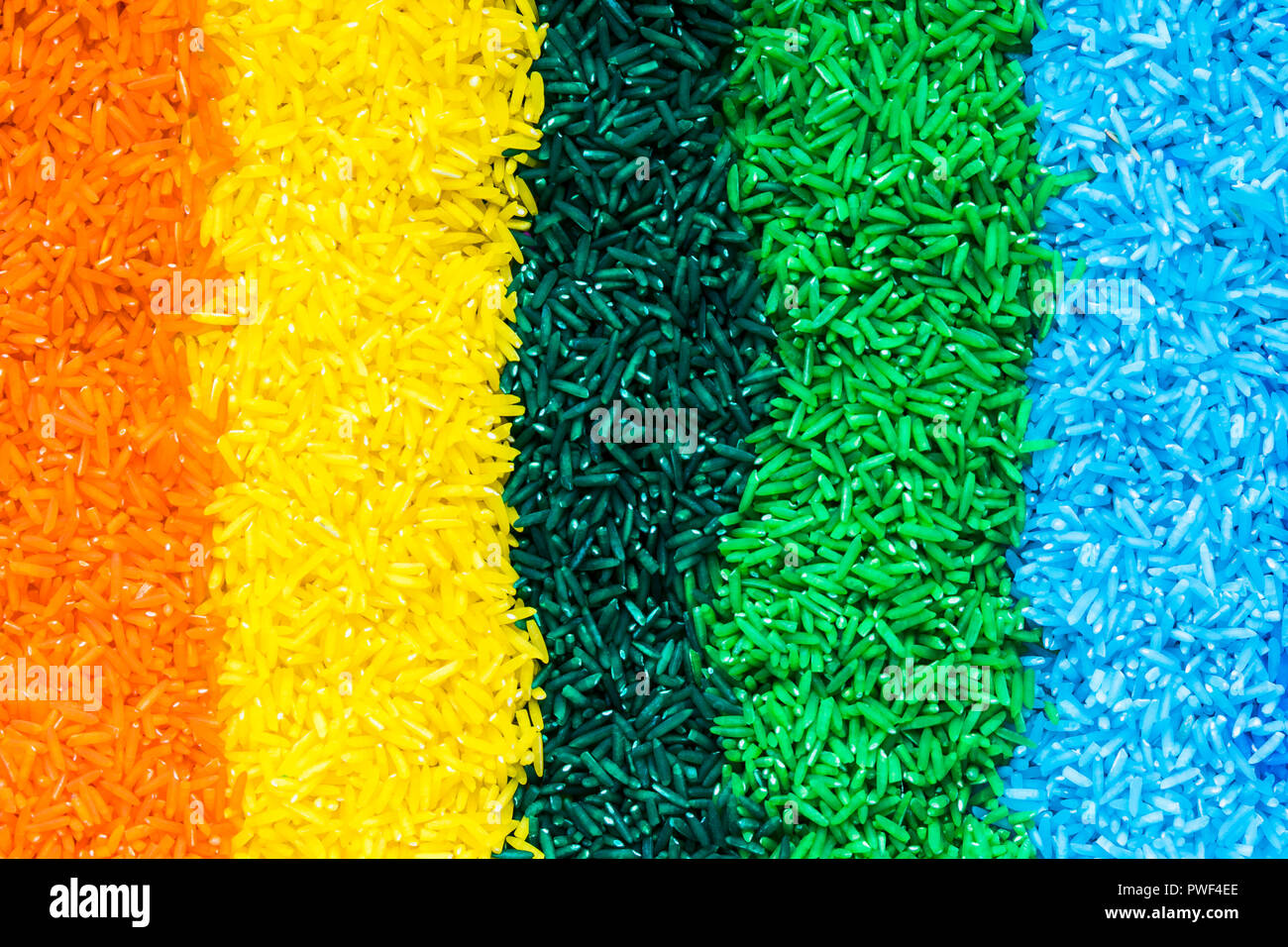 Vertical lines with colorful rice grain Stock Photo - Alamy