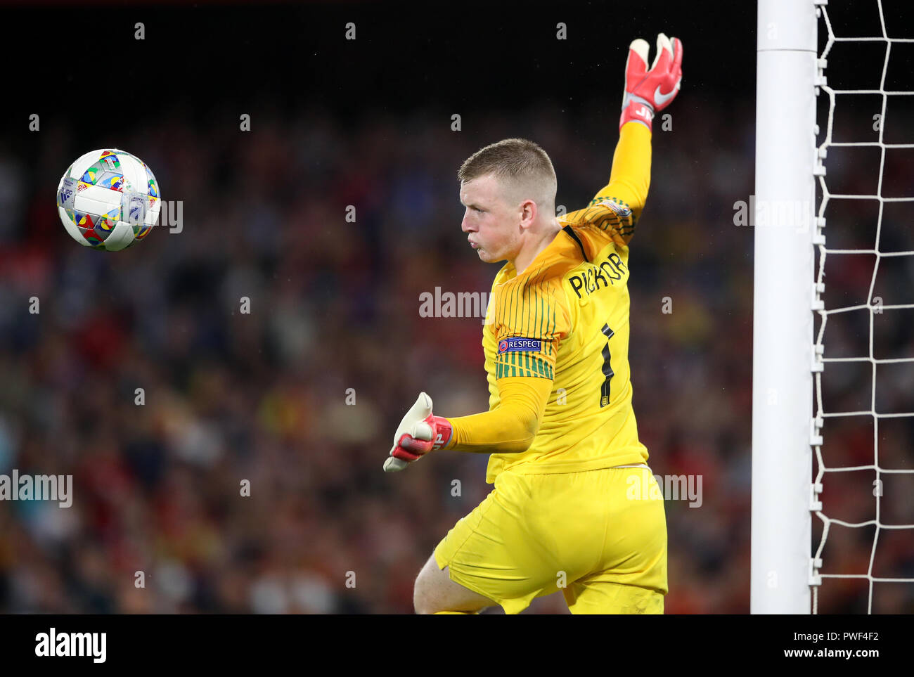 England's Jordan Pickford makes a save during the Nations League match ...