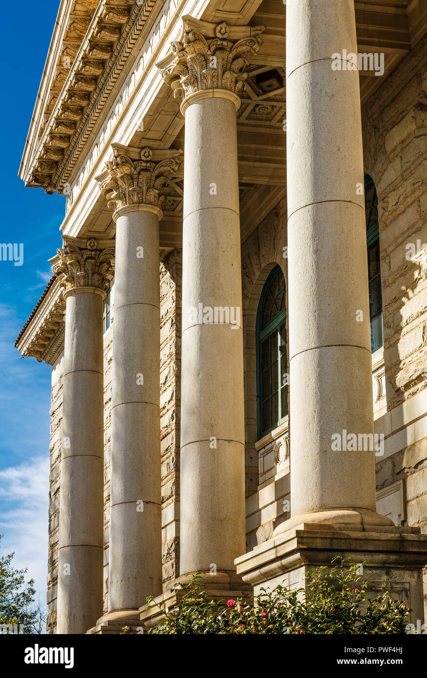 Columns of front of an old stone courthouse Stock Photo - Alamy
