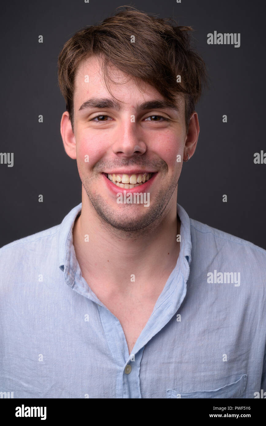 Studio portrait blue background hi-res stock photography and images - Alamy