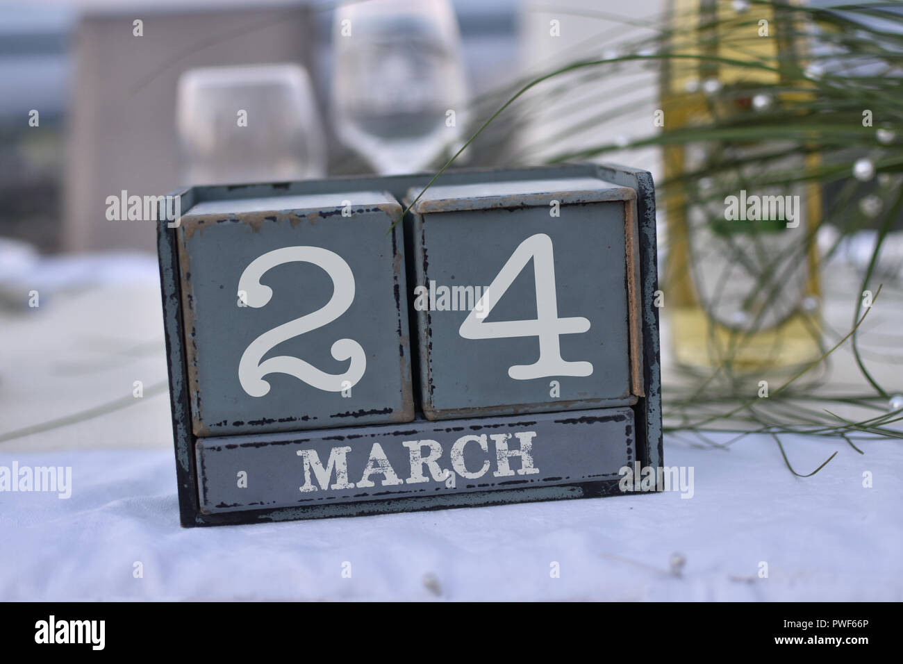 Wood blocks in box with date, day and month 24 March. Wooden blocks ...
