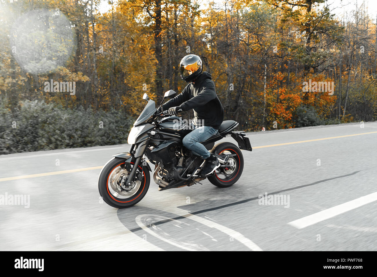 Motorcycle rider and fall color hi-res stock photography and images - Alamy