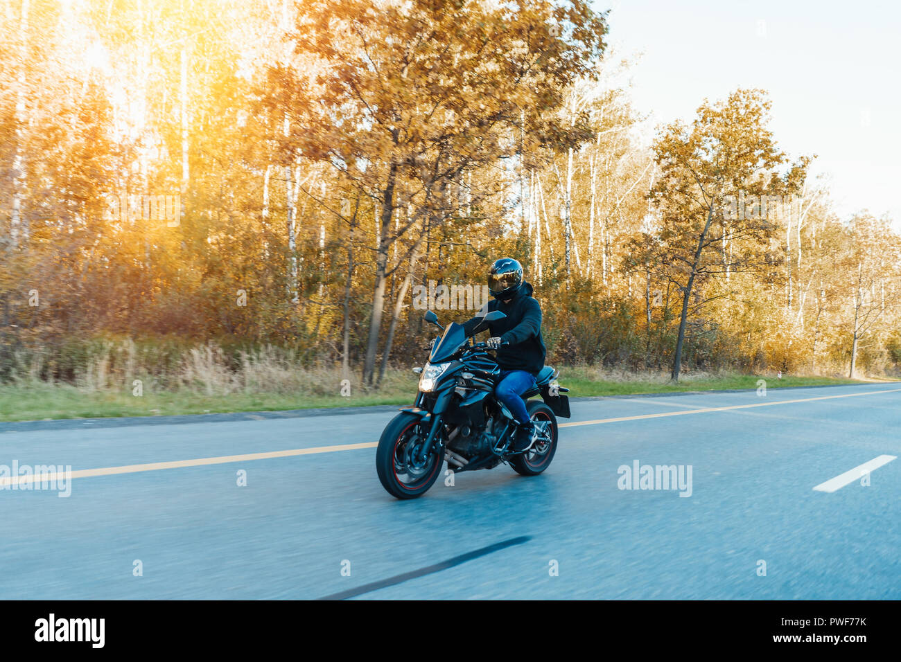 Motorcycle rider and fall color hi-res stock photography and images - Alamy