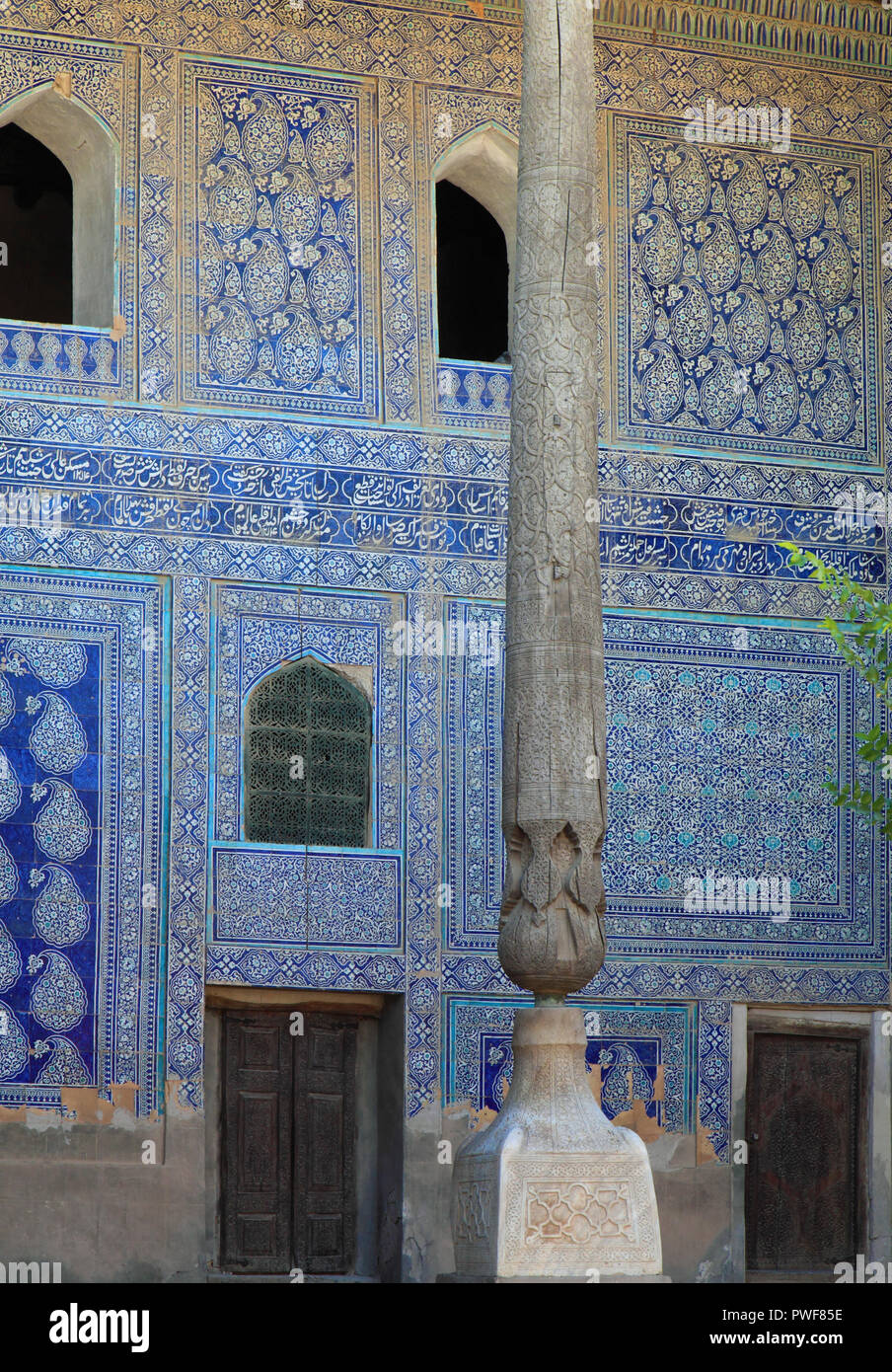 Uzbekistan, Khiva, Tosh Hovli Palace, carved wooden pillar, ceramic ...