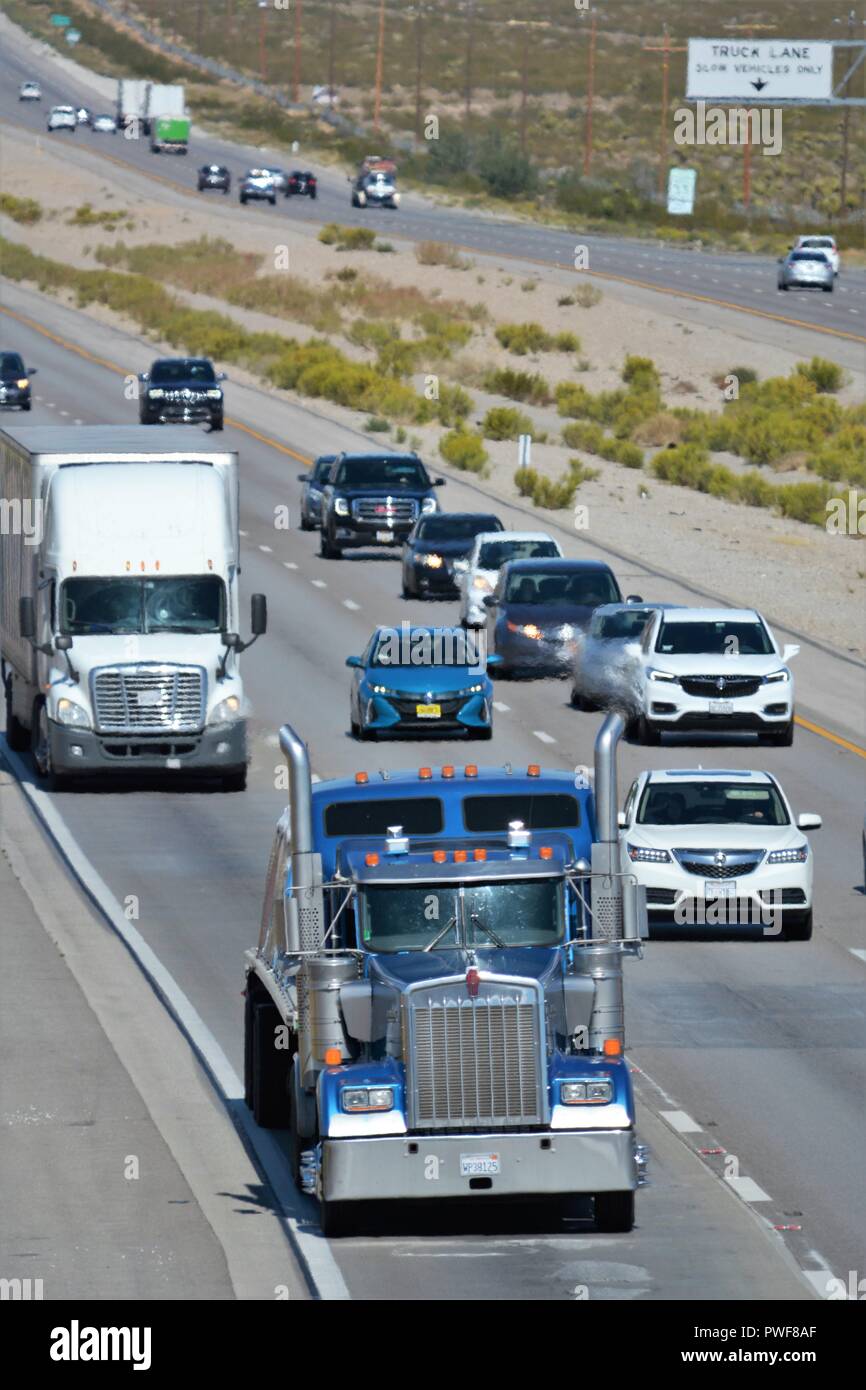 Trucks and cars on interstate highway in Nevada going west to Los ...