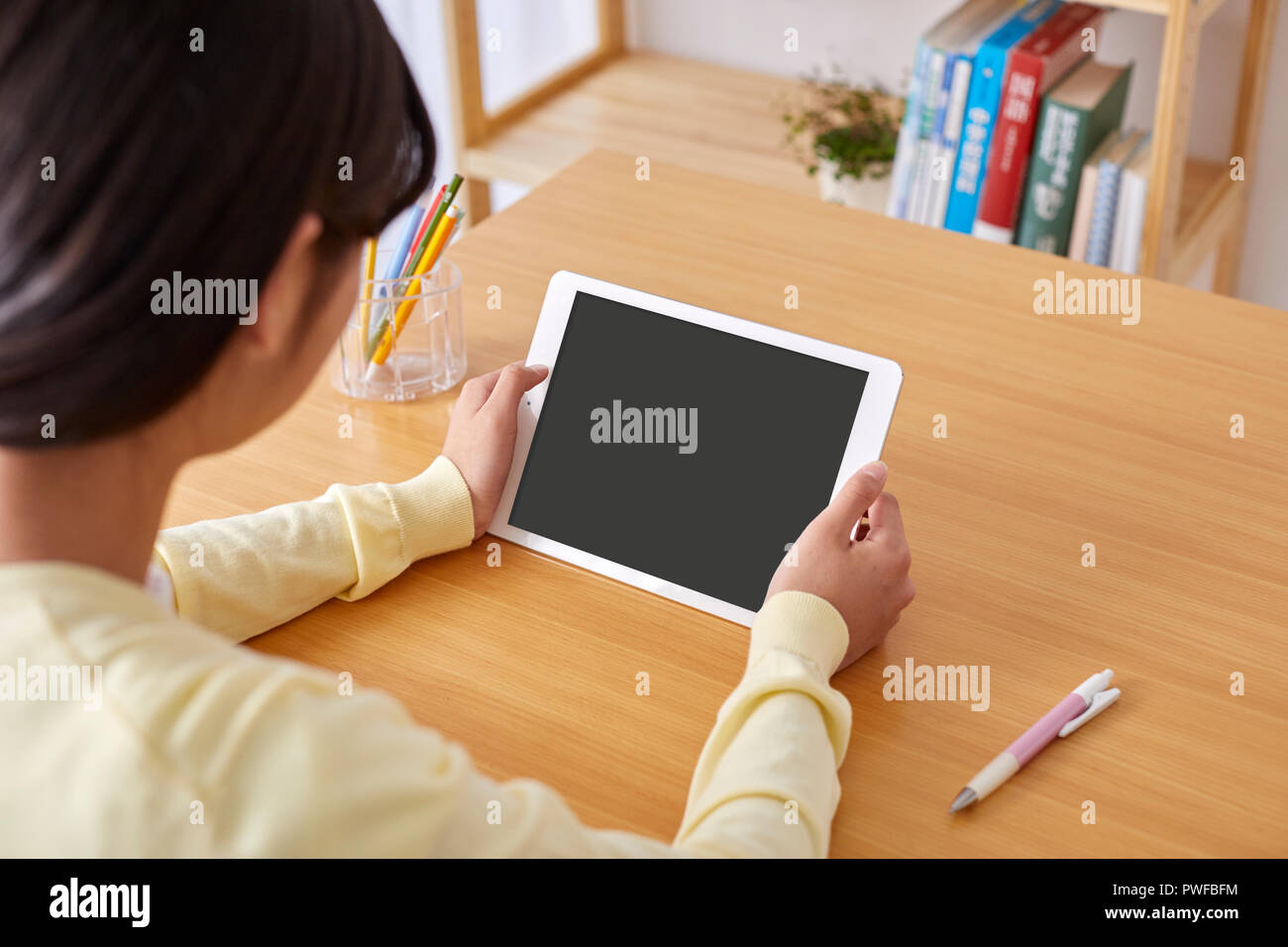 Japanese kid studying at home Stock Photo - Alamy