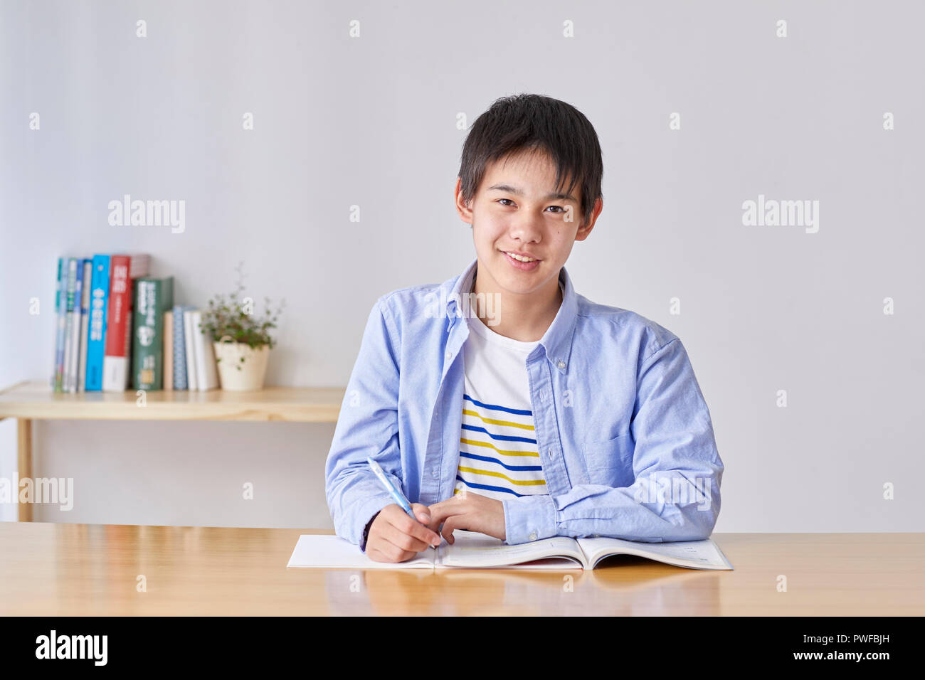 Japanese kid studying at home Stock Photo - Alamy