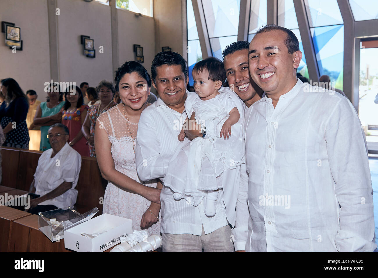 MERIDA, YUC/MEXICO - NOV 18, 2018: Godfather and wife hold their ...