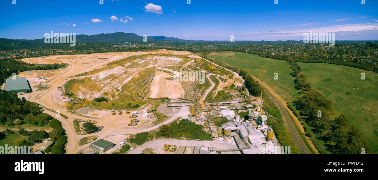Limestone mine and heavy machinery in Melbourne, Australia - aerial ...