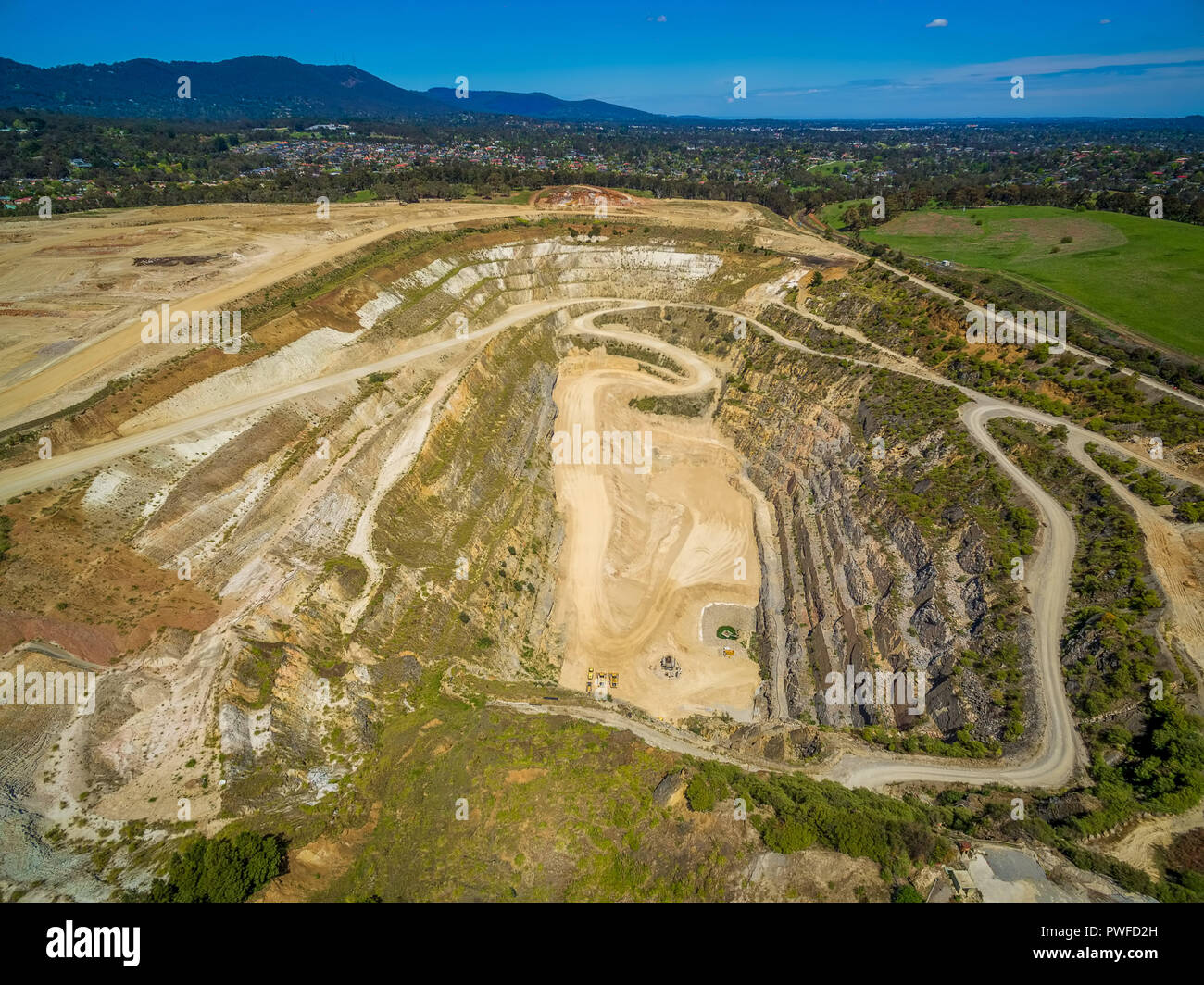 Aerial landscape of closed mine pit and mountains Stock Photo - Alamy