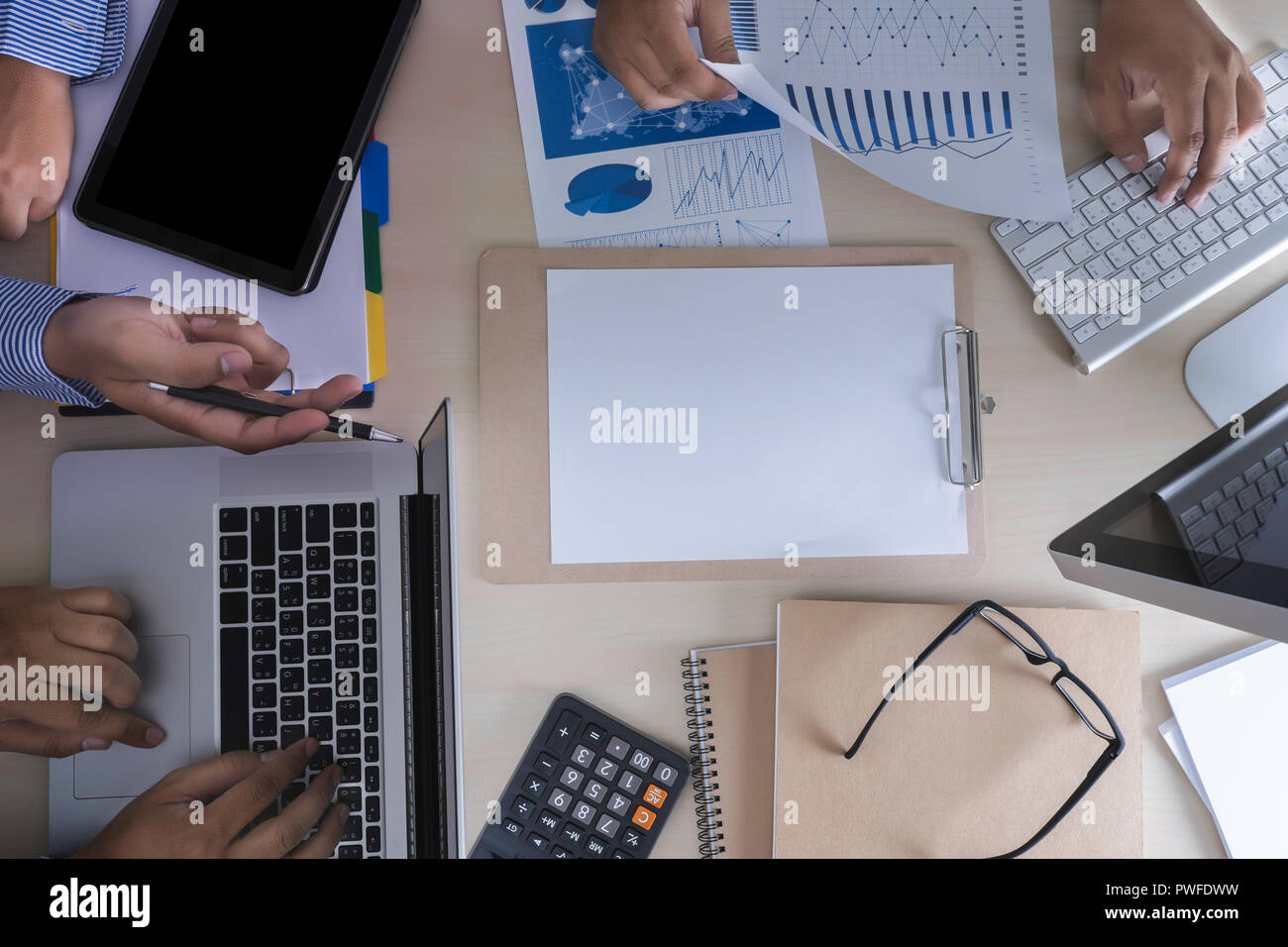 analyzing the work Accounting on Laptop investment concept Stock Photo ...