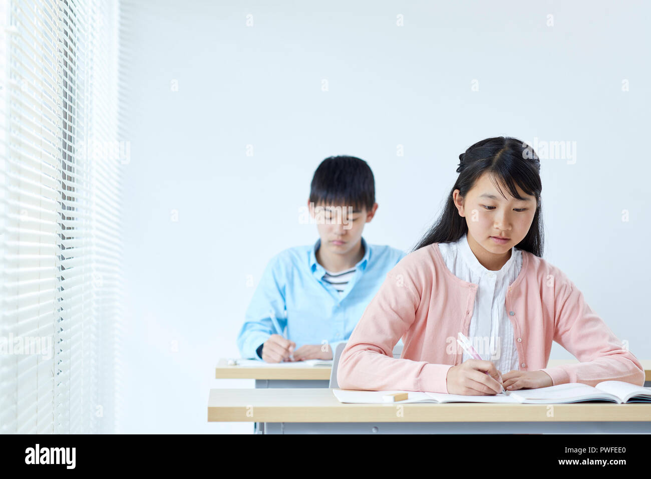 Japanese kids studying Stock Photo - Alamy