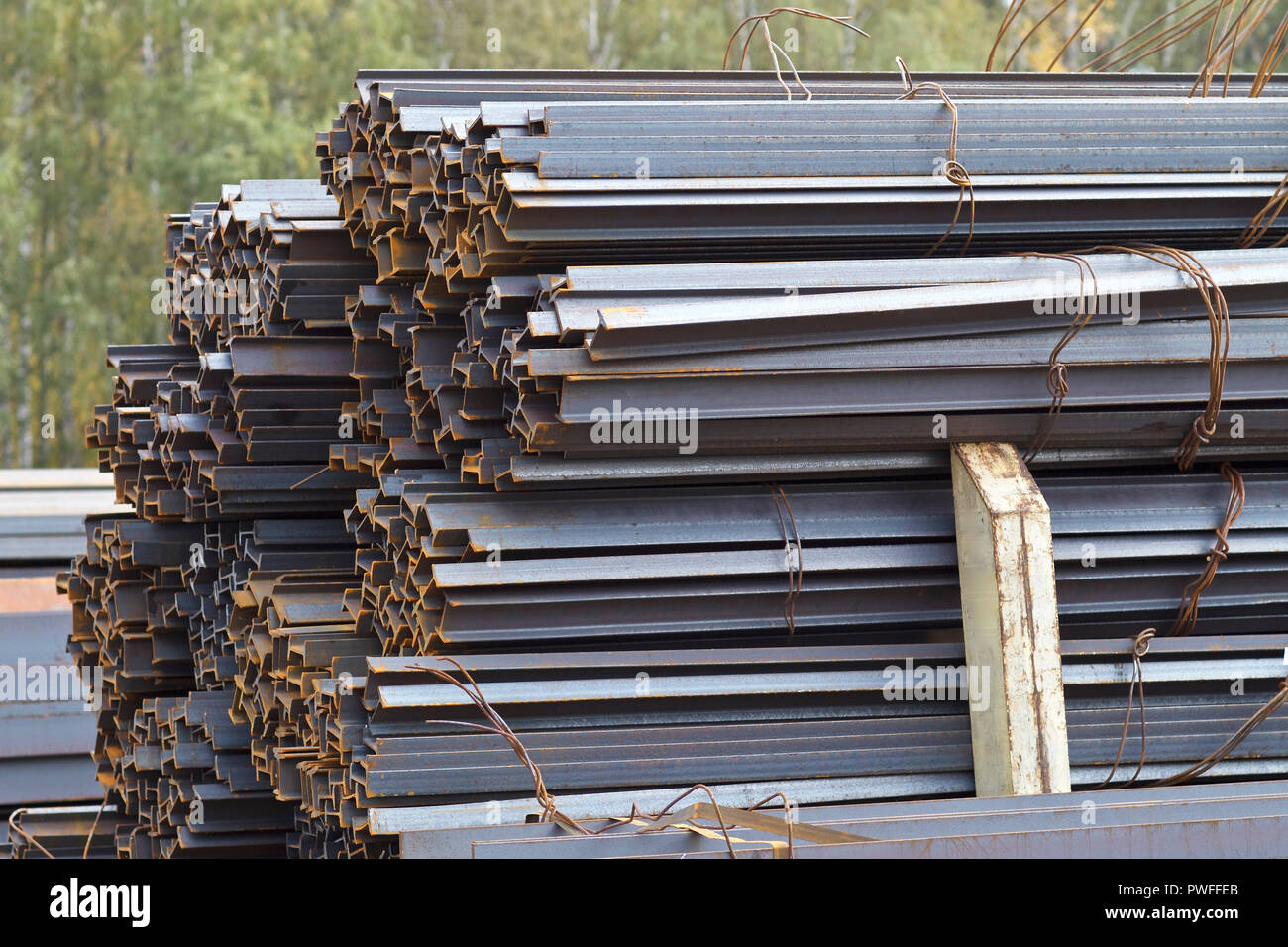 Metal profile beam in packs at the warehouse of metal products Stock ...