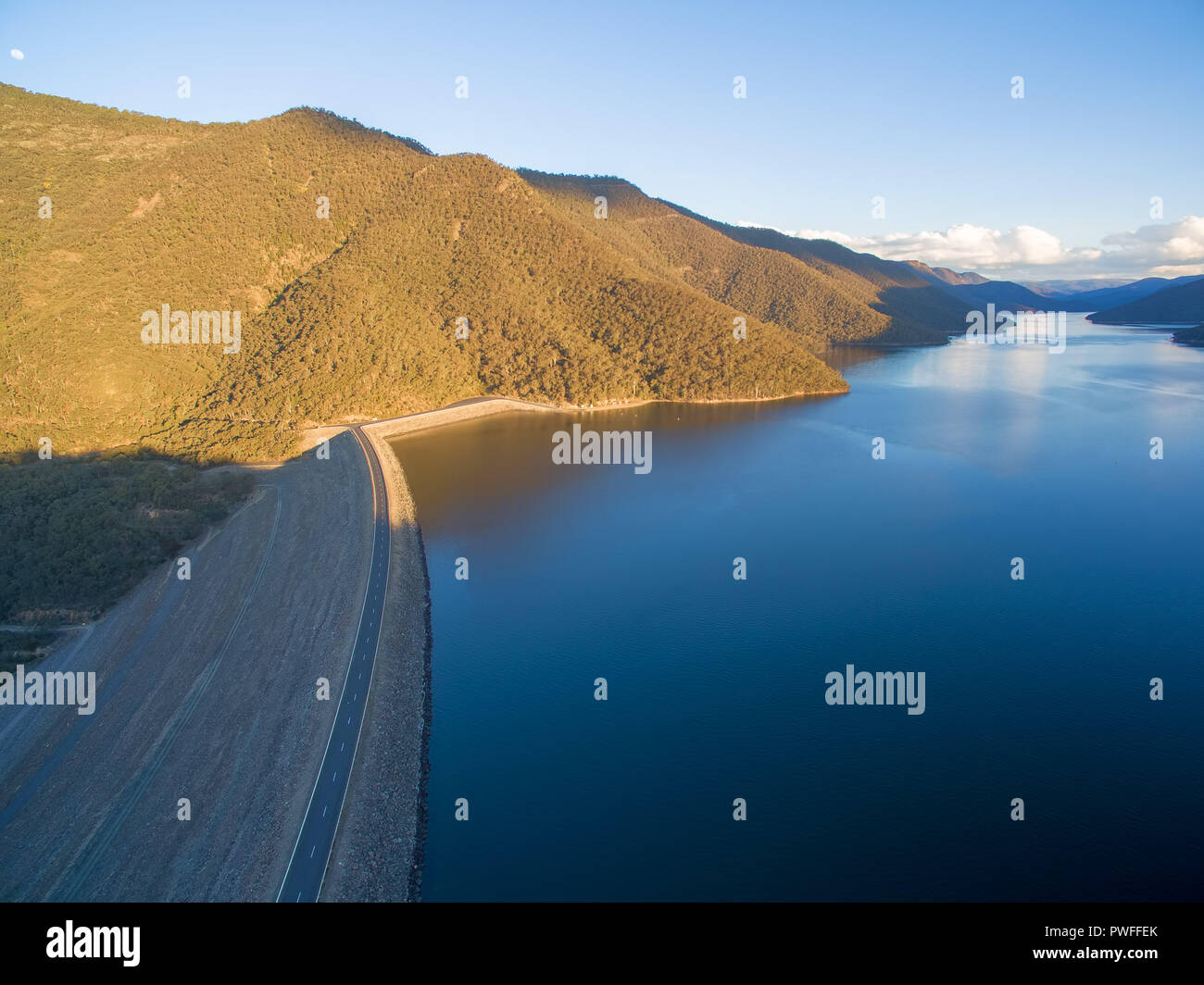 Talbingo Reservoir and dam wall with road at sunset. NSW, Australia ...