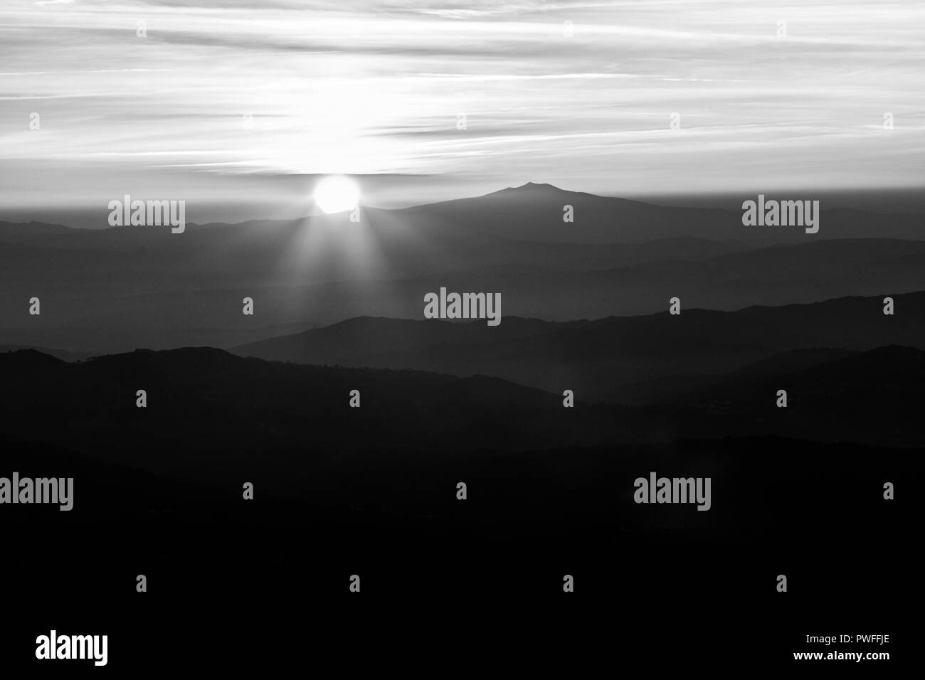 Bright sun behind Black and White Stock Photos & Images - Alamy