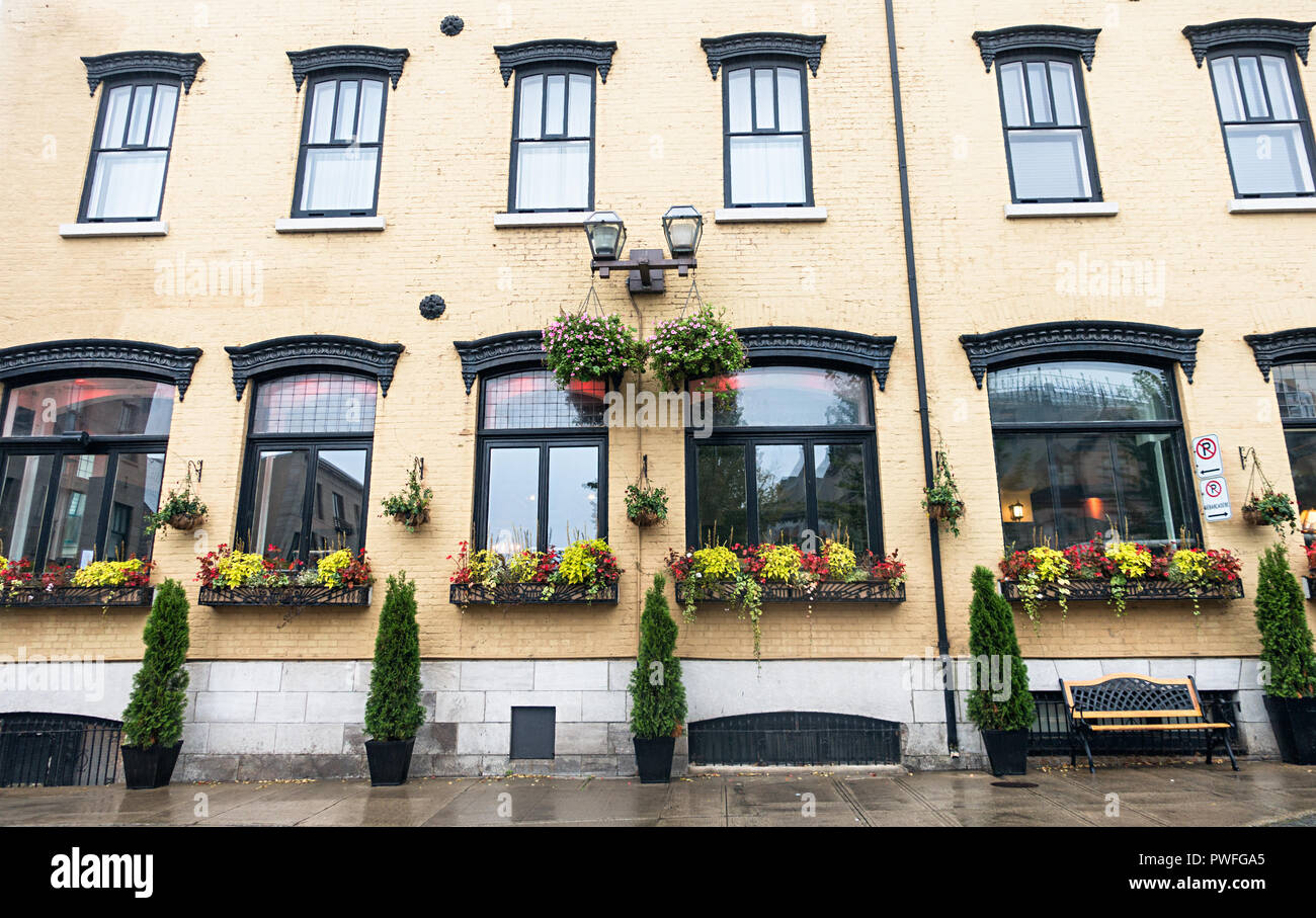 The building decorated with the flowers Stock Photo - Alamy