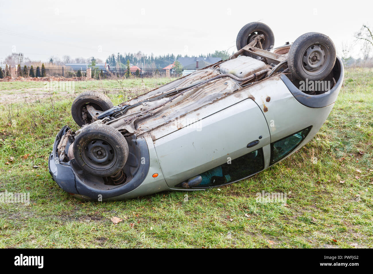 Traffic accident, car after rollover lie on the roof Stock Photo - Alamy