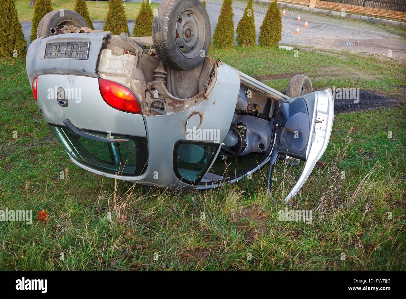 Traffic accident, car after rollover lie on the roof Stock Photo - Alamy