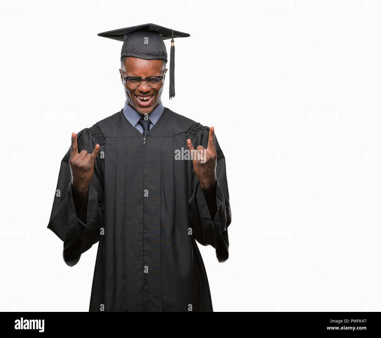 Young graduated african american man over isolated background shouting ...