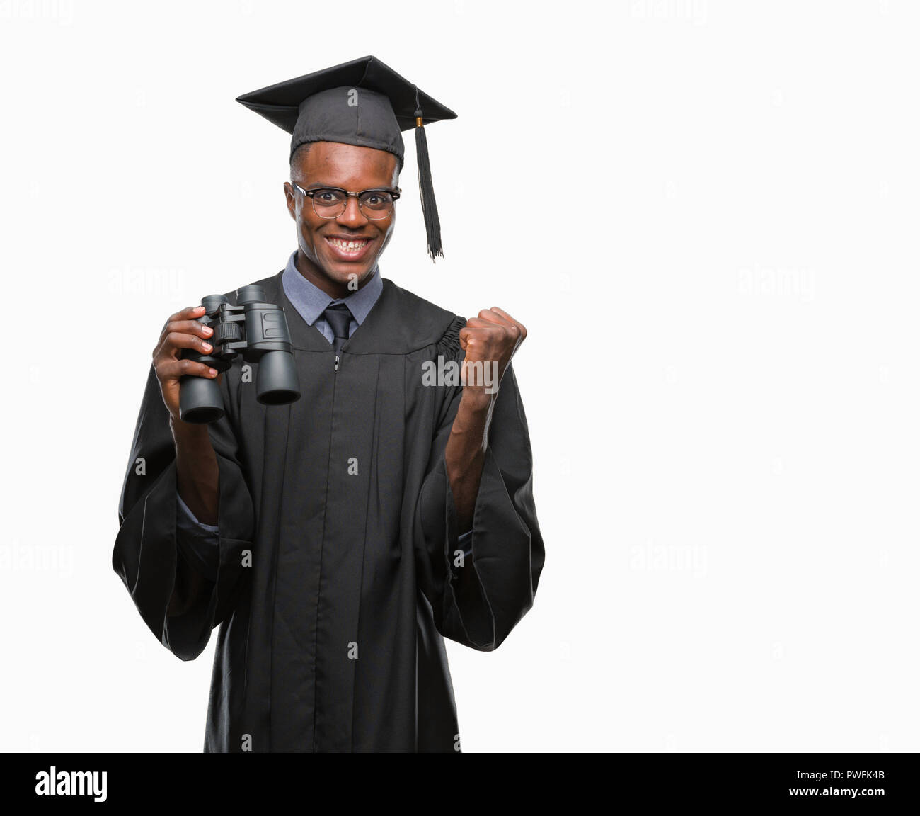 African man celebrating success using hi-res stock photography and ...