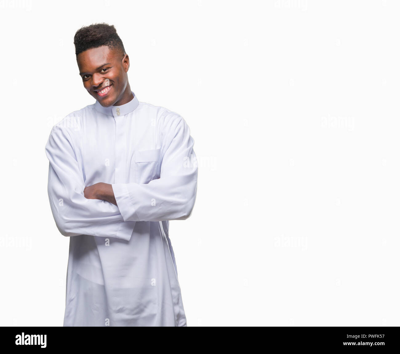 Young arabic african man wearing traditional djellaba over isolated ...