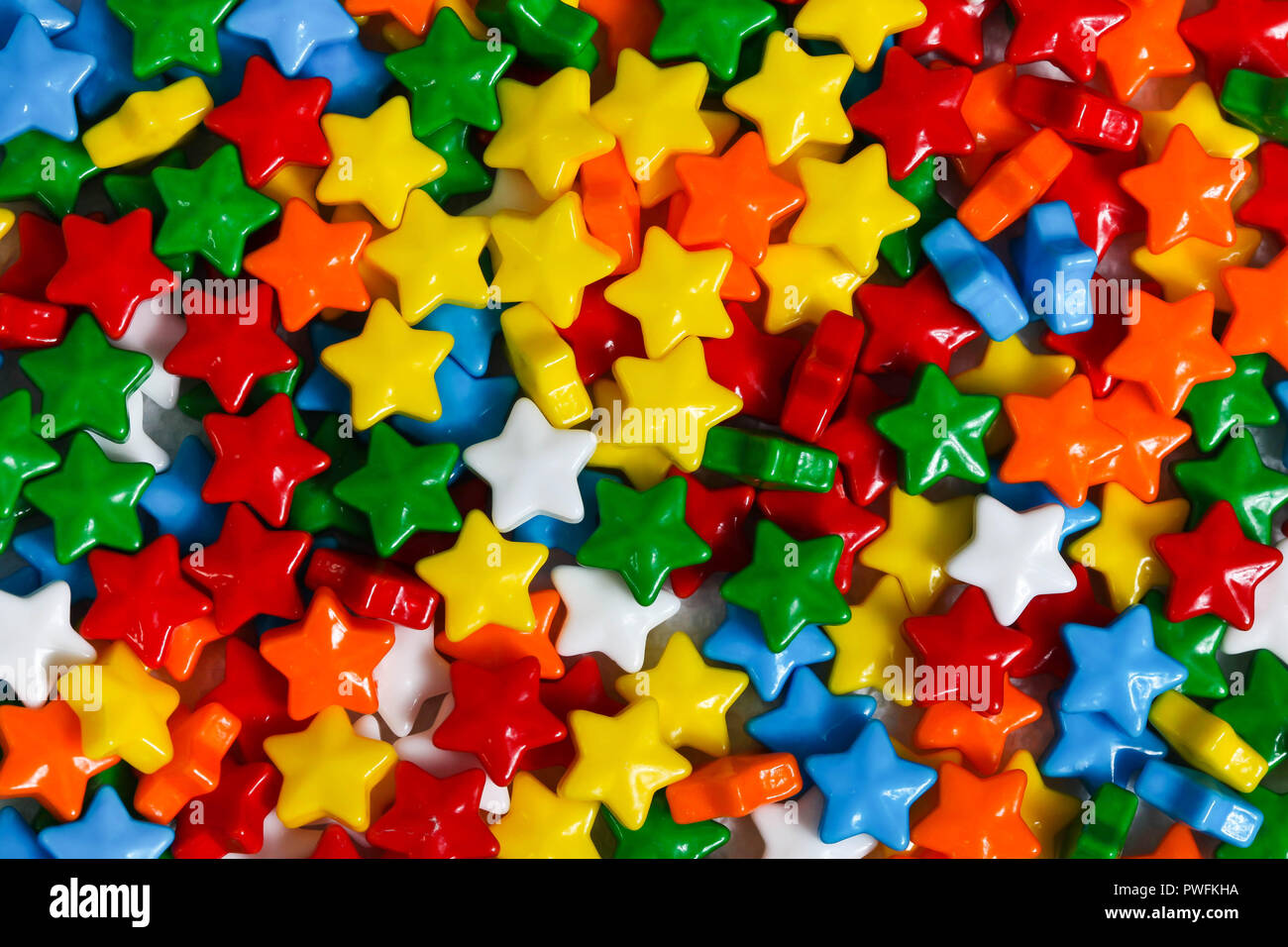 Multicolored stars candy background Stock Photo - Alamy
