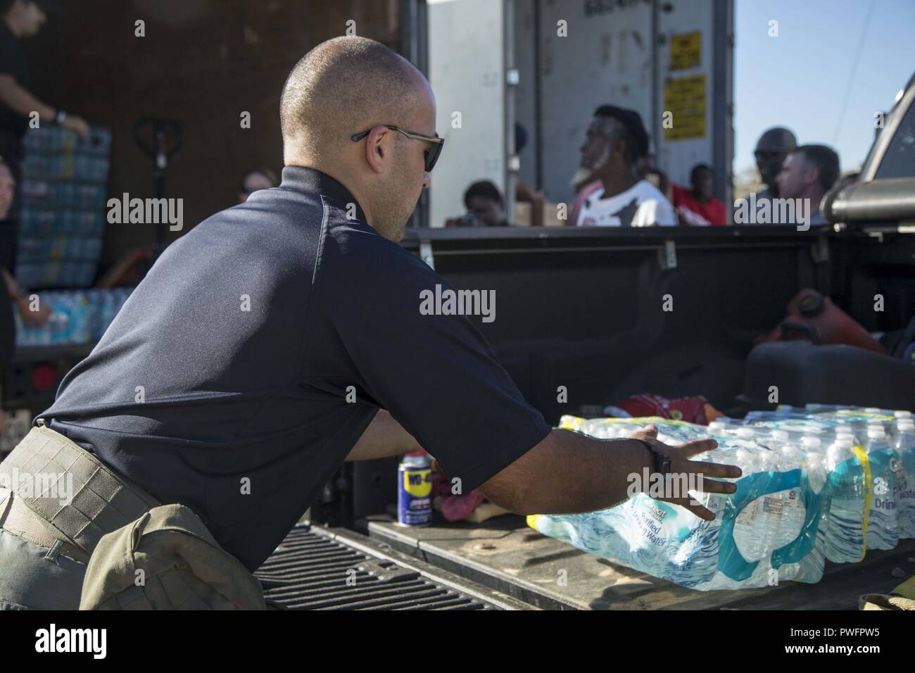 Blountstown, FL, October 13, 2018 - volunteers load vehicles with food ...