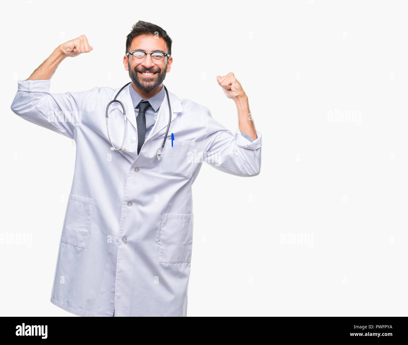 Adult hispanic doctor man over isolated background showing arms muscles ...