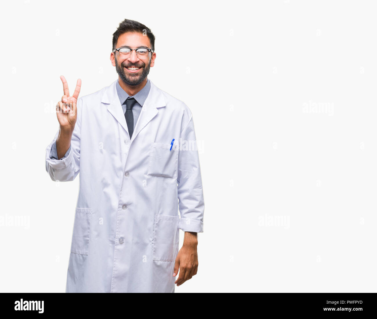 Adult hispanic scientist or doctor man wearing white coat over isolated ...