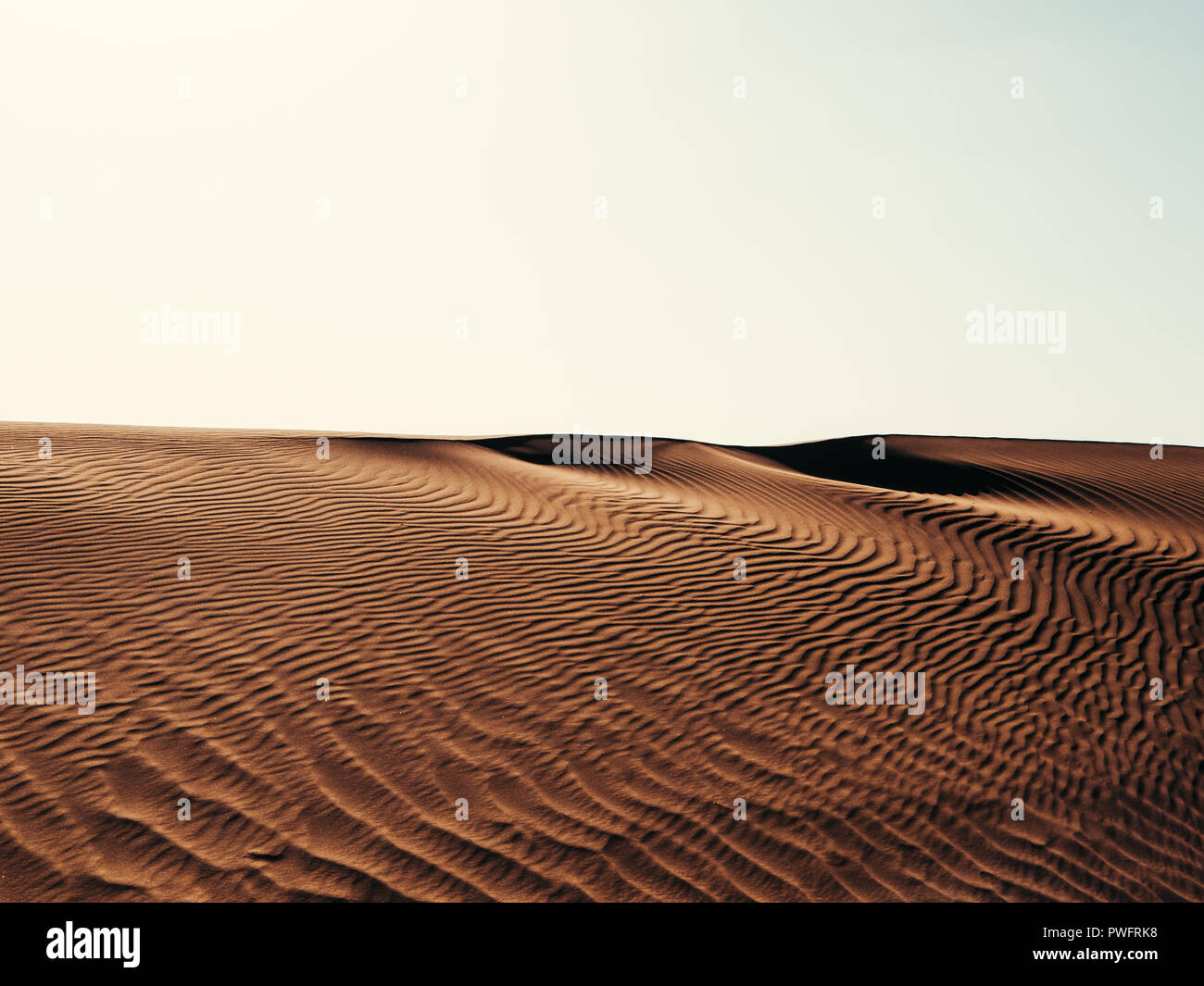 Sand Dunes in the Moroccan Part of Sahara Desert, with blue sky Stock ...