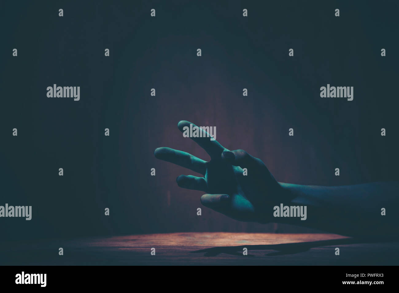 White witch hands black nails hi-res stock photography and images - Alamy