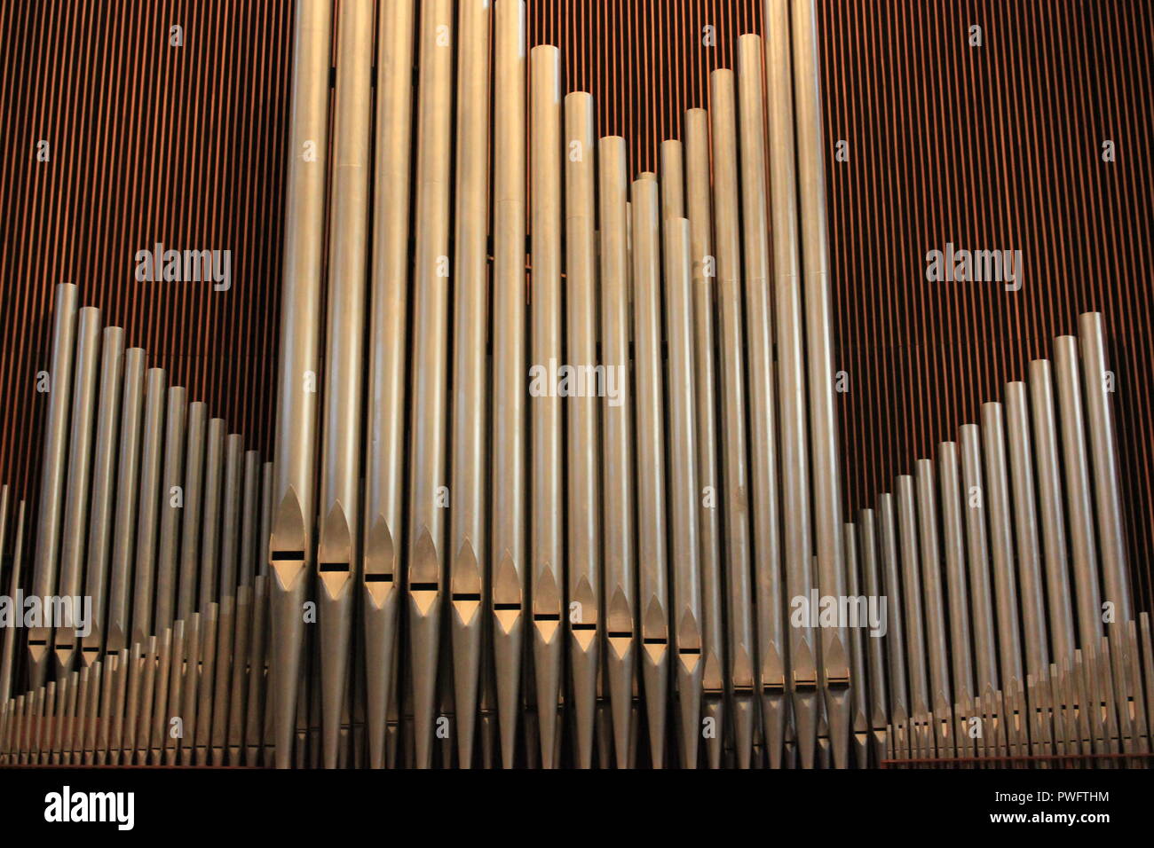 Huge modern pipe organ on display in the interior of the ...