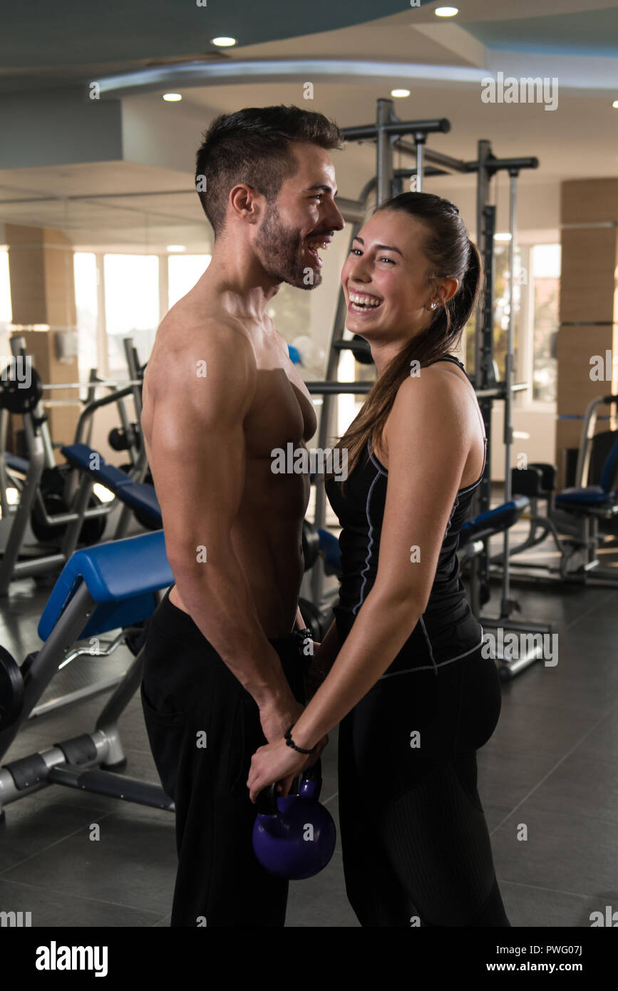Portrait Of A Physically Fit Couple Showing Their Well Trained Body ...
