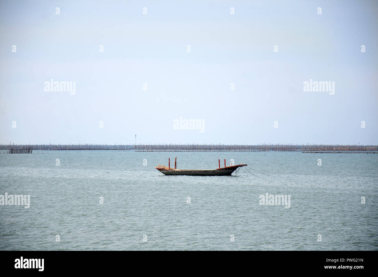 Fishing boat and ship floating in the sea for waiting fishing in night ...