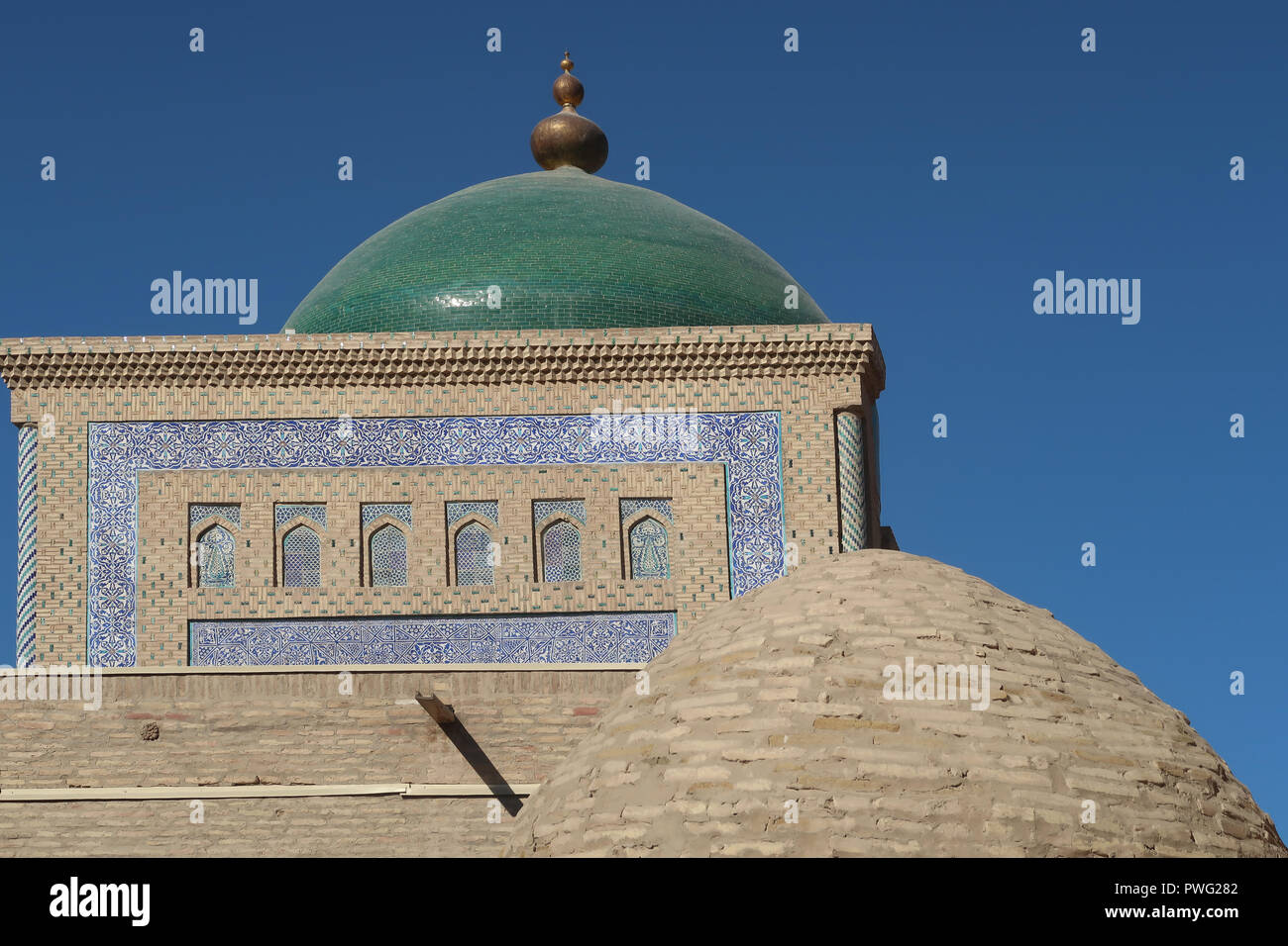 View of the Pahlavan Mahmud mosque in the Ichan-Kala historic city of ...