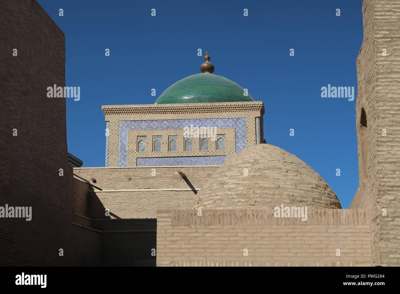 View of the Pahlavan Mahmud mosque in the Ichan-Kala historic city of ...