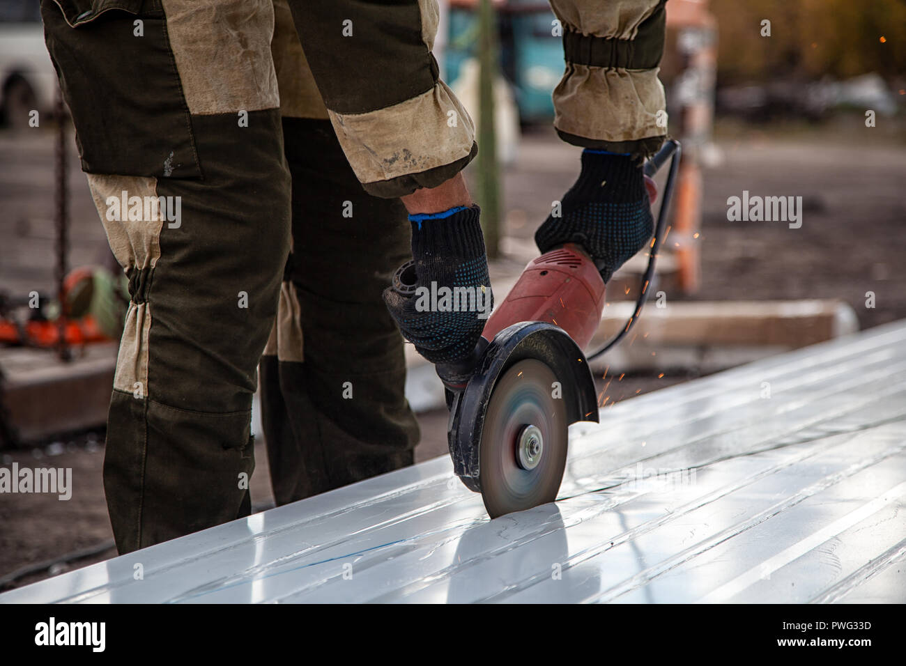 Male hands angle grinder cutting hi-res stock photography and images ...
