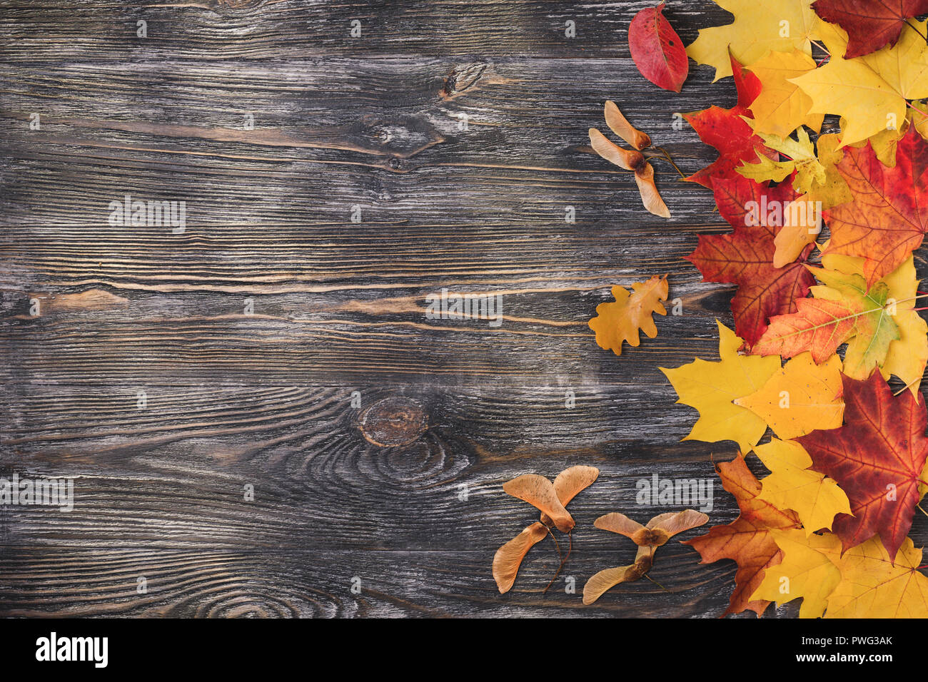 Autumn wooden background with yellow leaves. Top view with copy space ...