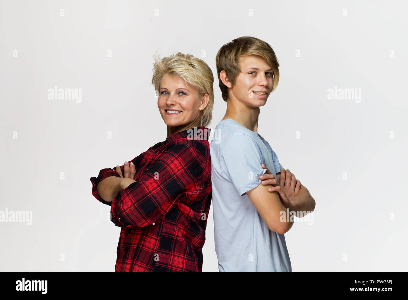 Two family arms hi-res stock photography and images - Alamy
