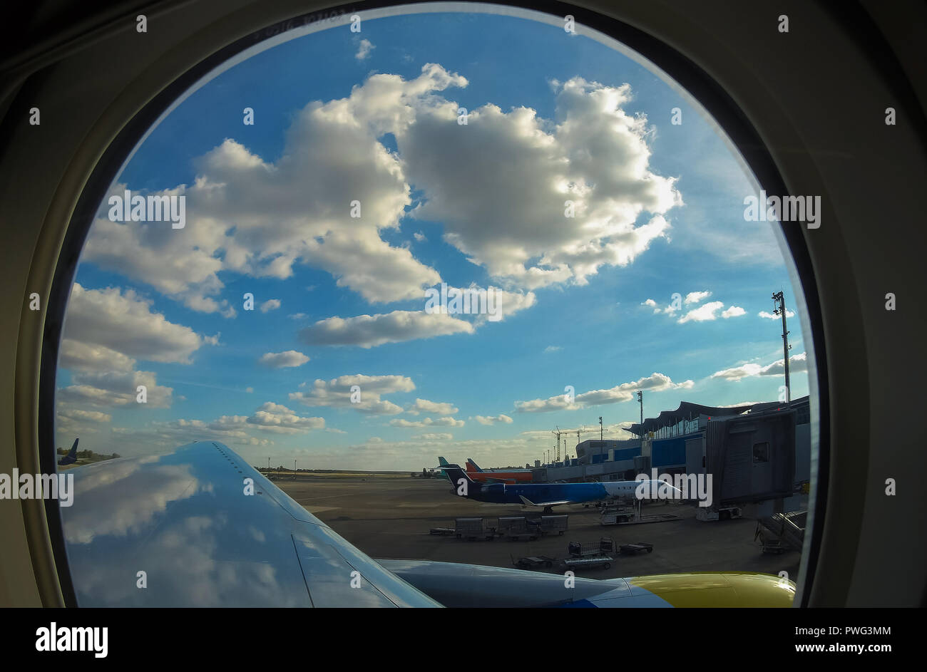 Passenger planes at the airport, view through window Stock Photo - Alamy