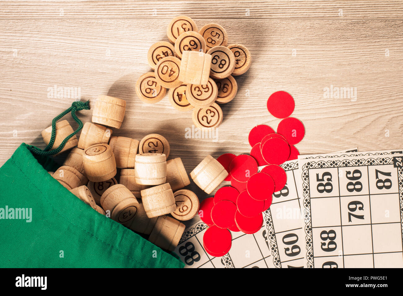 Board game lotto. Wooden lotto barrels with bag, red chips and game ...