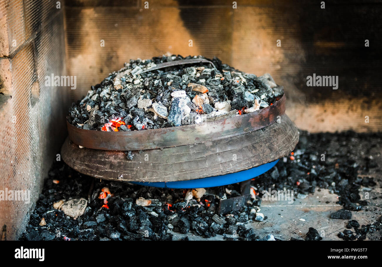 Cooking of traditional Balkan Greek Mediterranean Croatian meal Peka in ...
