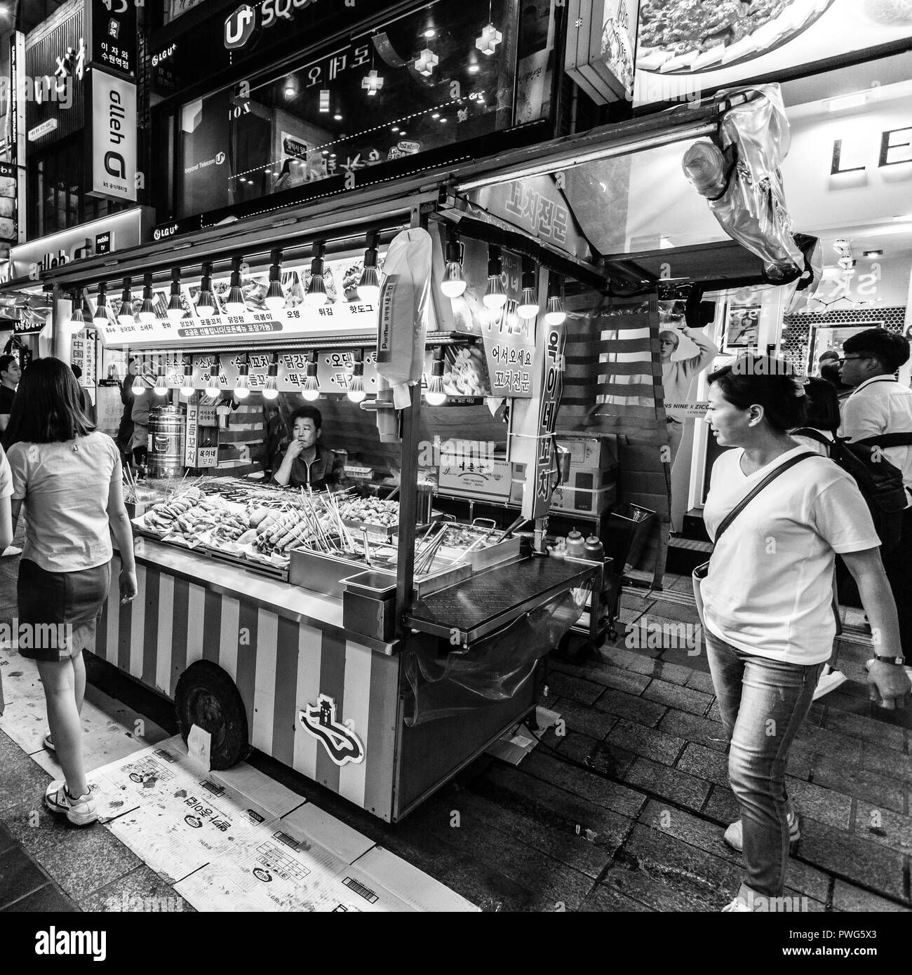 Suwon, South Korea. Vendor woman waiting of buyers in her fast food ...
