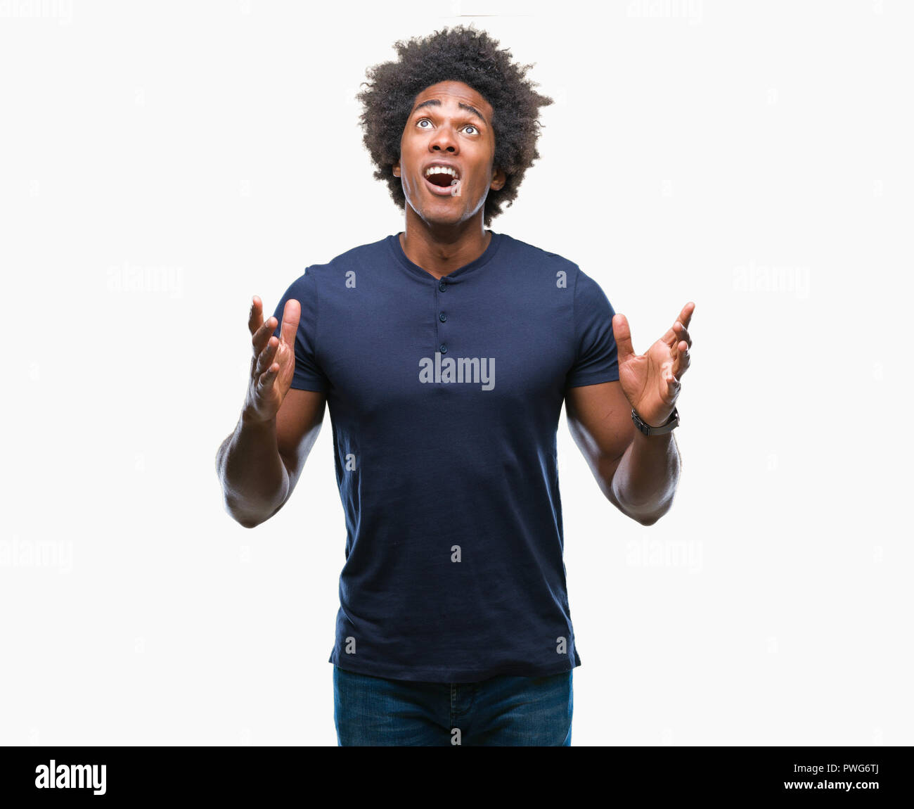 Afro american man over isolated background crazy and mad shouting and ...