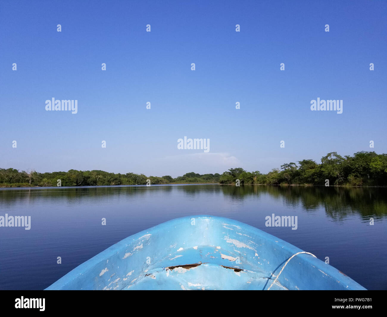 Enjoying a boat ride on the river showing only the bow and the river ...