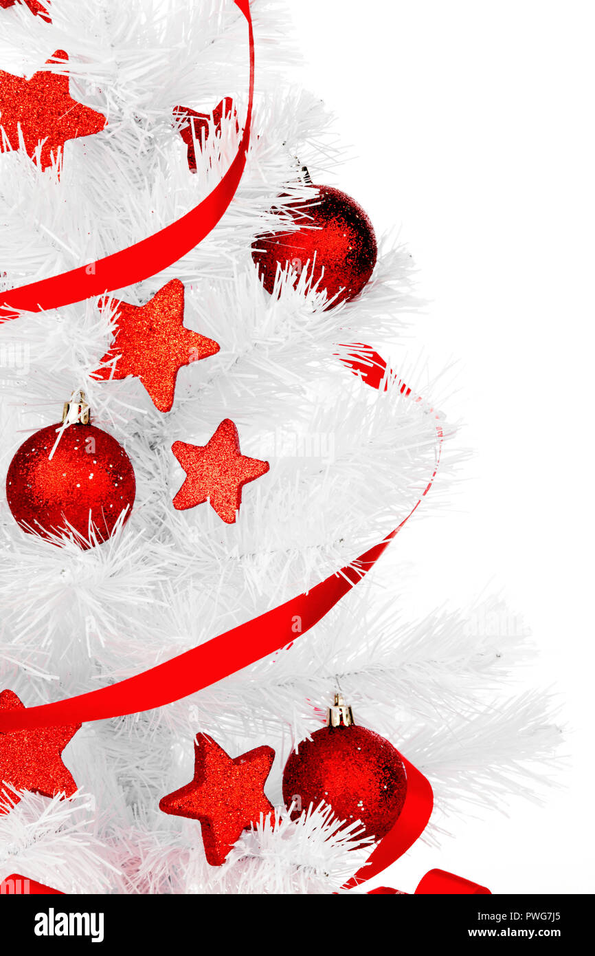White christmas tree with red decorations isolated on white background ...
