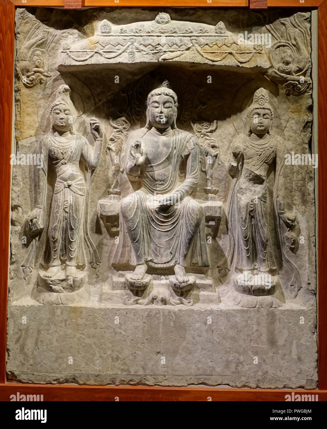 Buddha triad in a niche, Baoqingsi temple, Xi'an, Shaanxi province ...