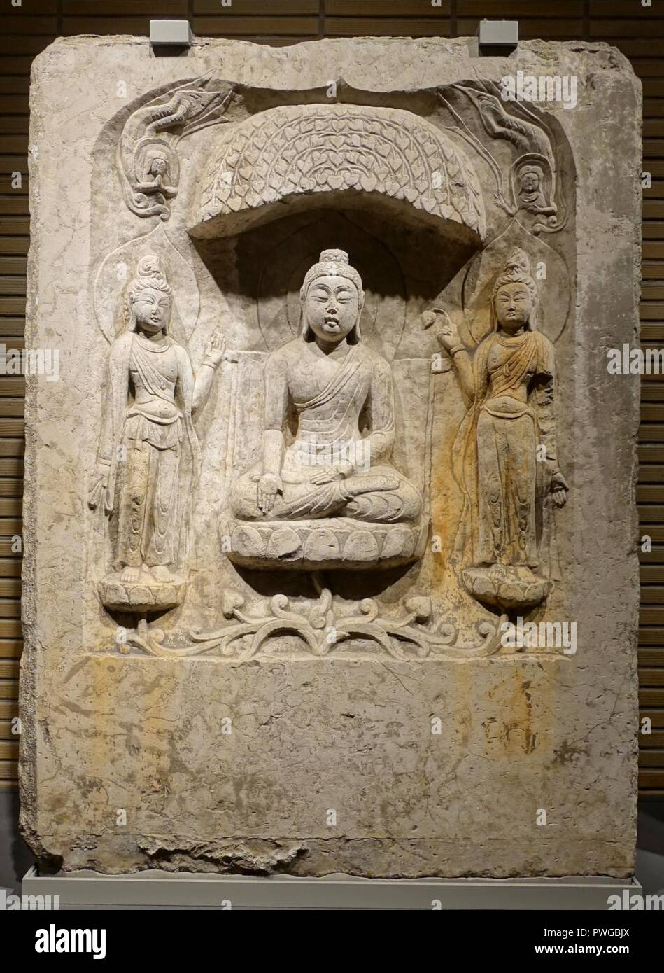 Buddha triad in a niche, Baoqingsi temple, Xi'an, Shaanxi province ...