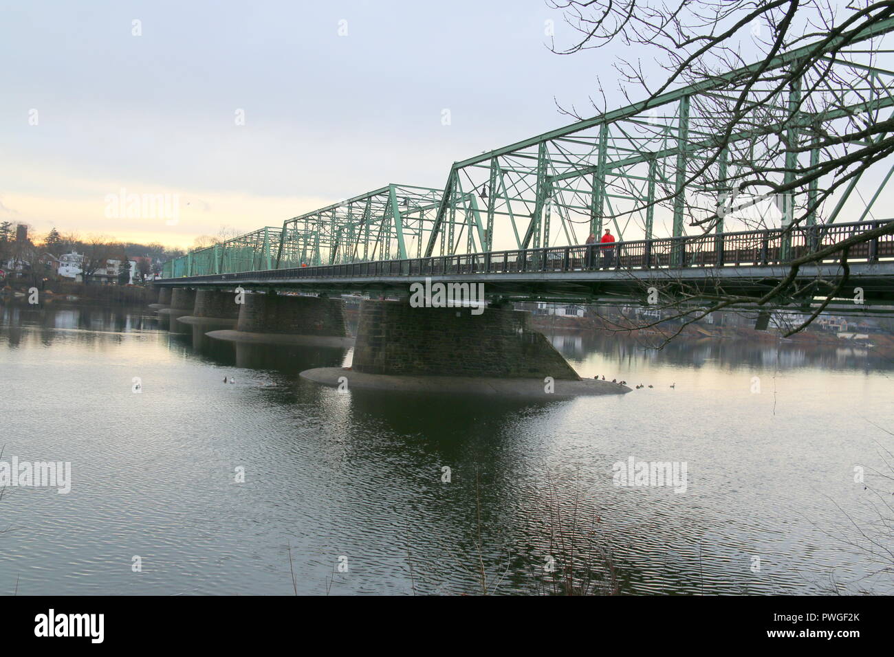 Person walking bridge hi-res stock photography and images - Alamy