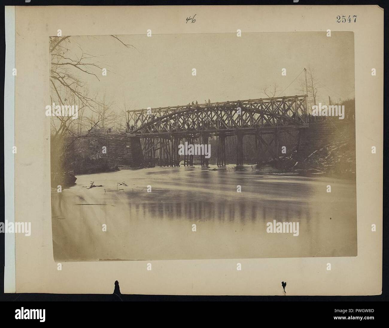 Building military railroad truss bridge across Bull Run, April, 1863 ...